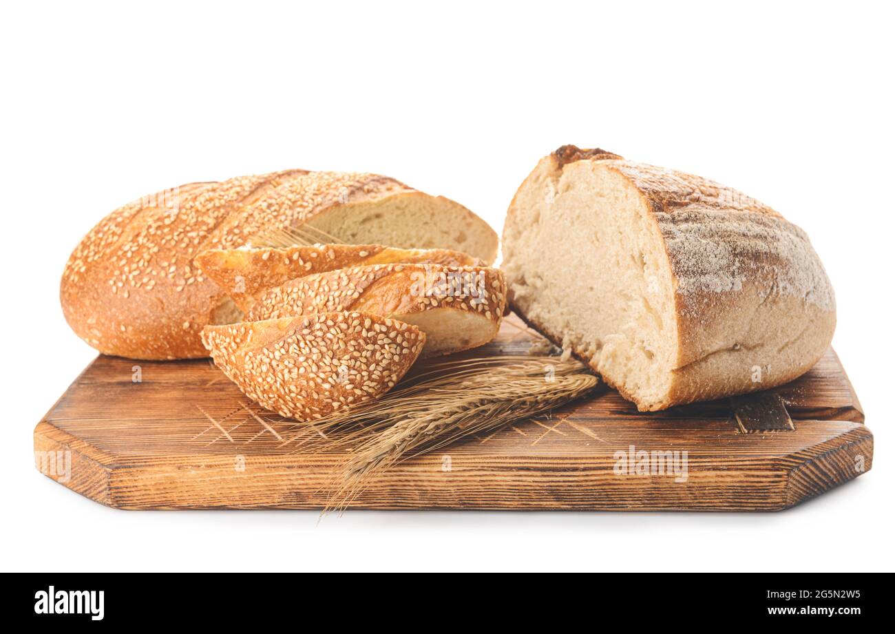 Board with fresh bread on white background Stock Photo - Alamy