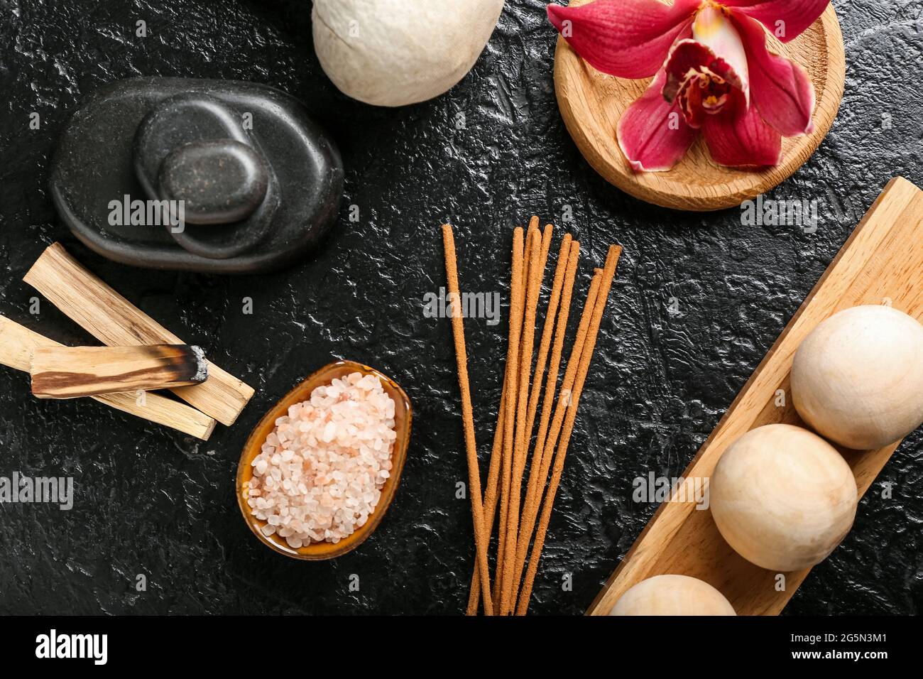 Beautiful spa composition on dark background Stock Photo - Alamy