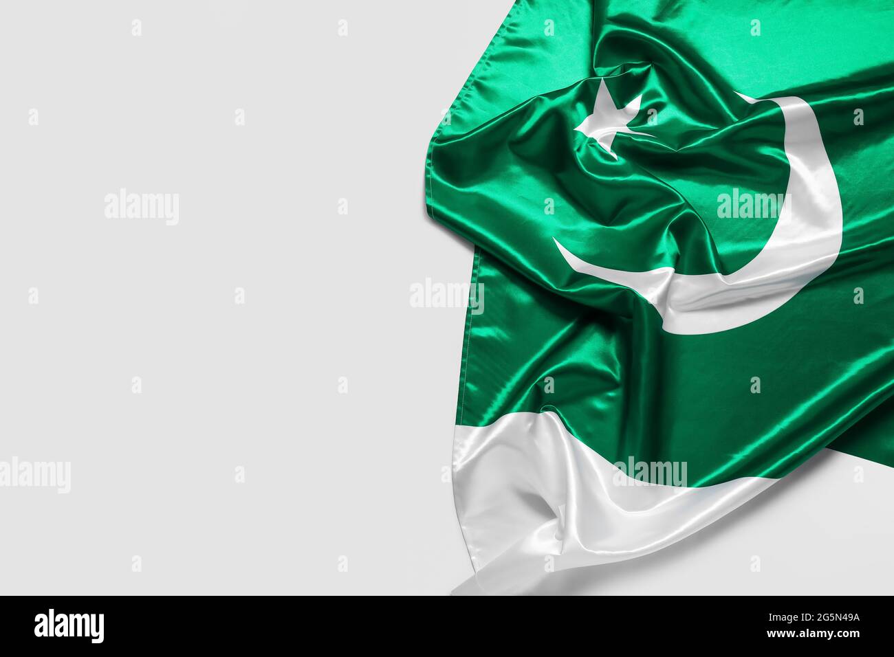 Pakistan flag on light background Stock Photo - Alamy