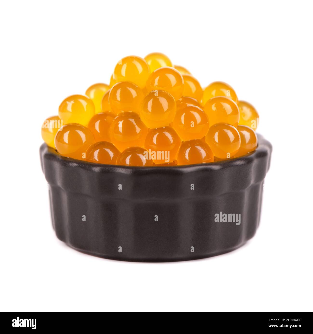 Yellow tapioca pearls for bubble tea isolated on white background ...