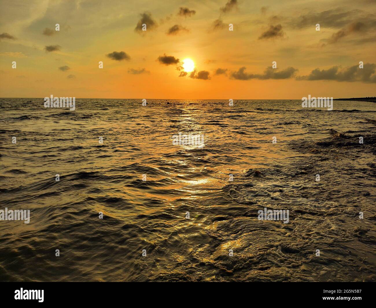 Waving water setting sun hi-res stock photography and images - Alamy