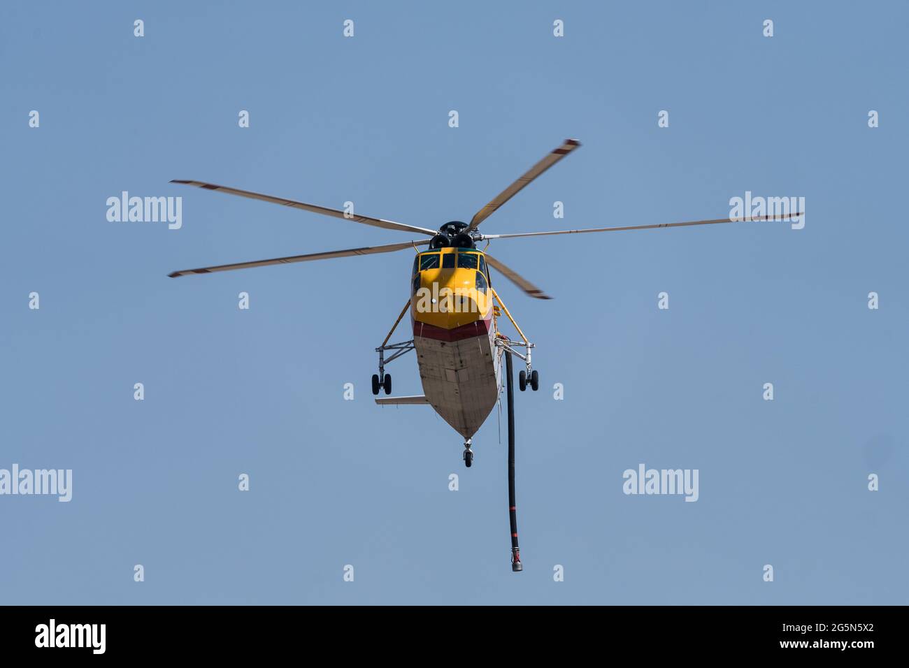 A Sikorsky S-61 fire-fighting helicopter configured for aerial fire ...