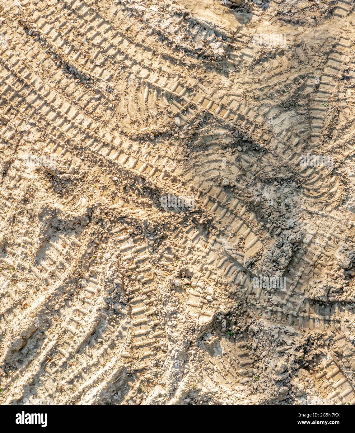 Aerial view of bulldozer tracks in dirt Stock Photo - Alamy