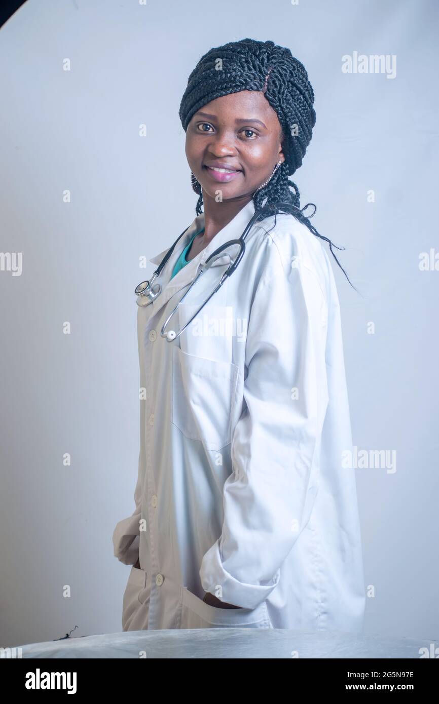 African nurse in white uniform hi-res stock photography and images - Alamy