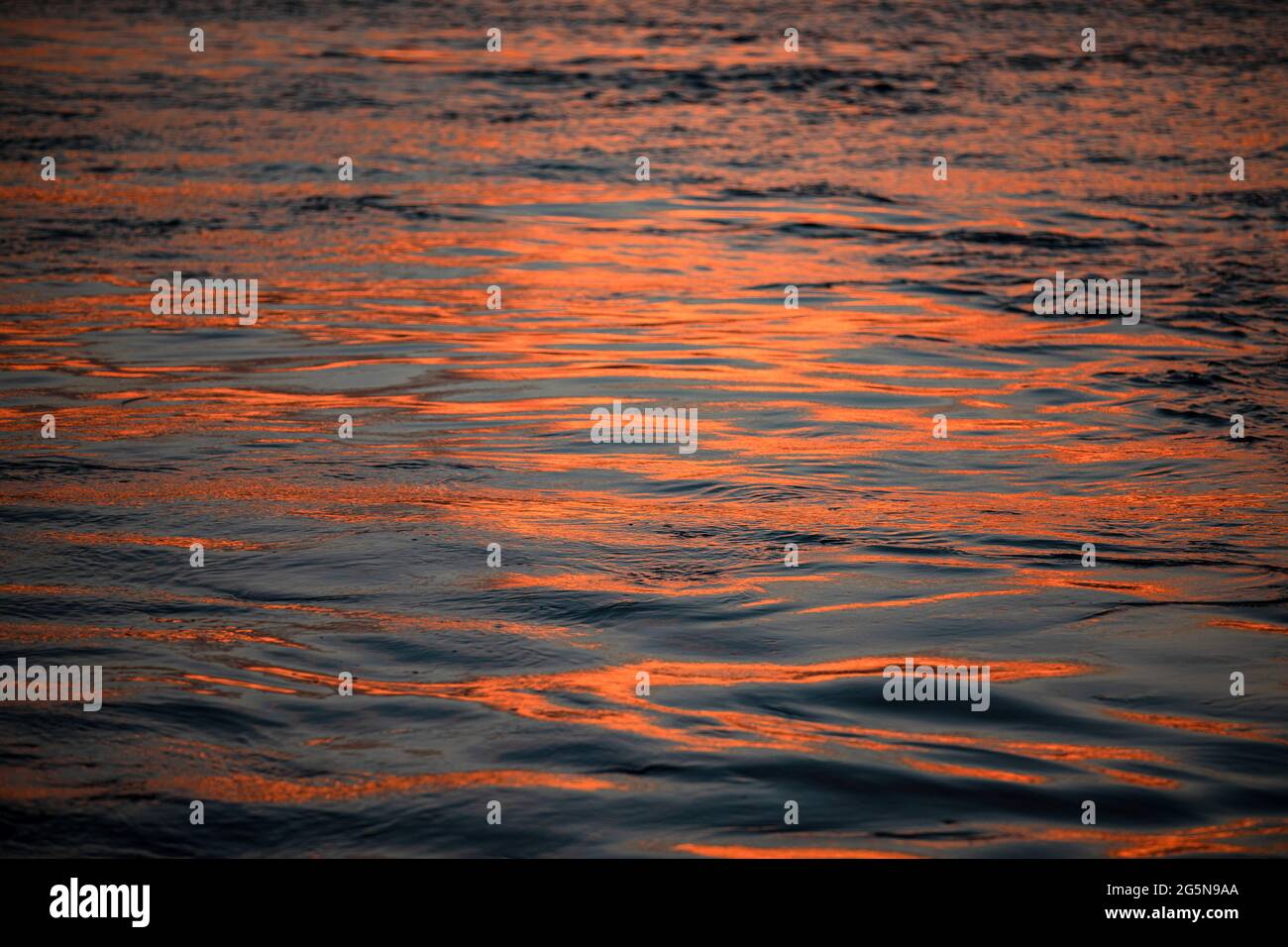 Istanbul, Turkey. 28th June, 2021. The sunset is seen reflected on the ...