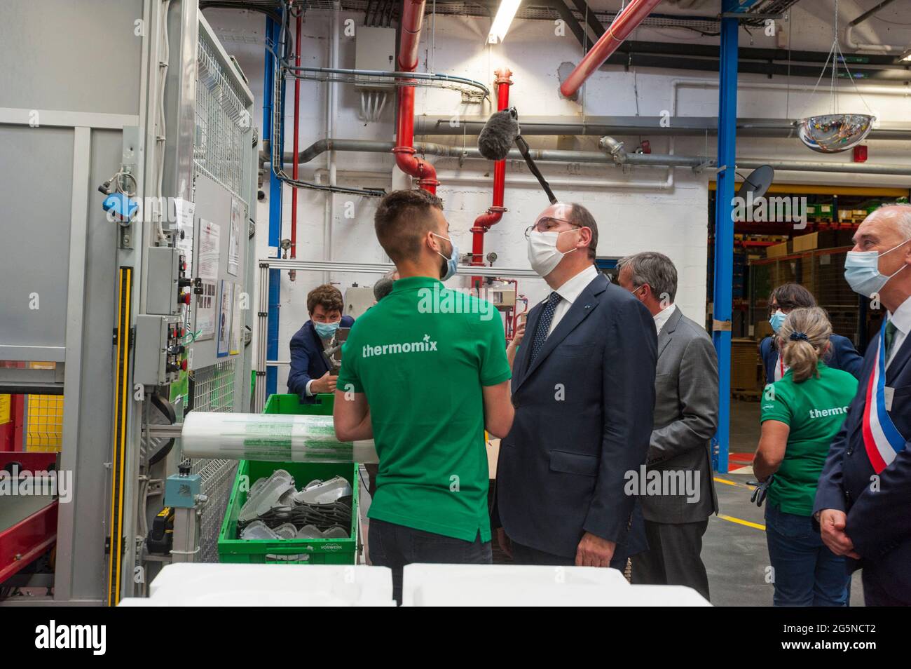 Prime minister Jean Castex talks to employees as he visits the French ...