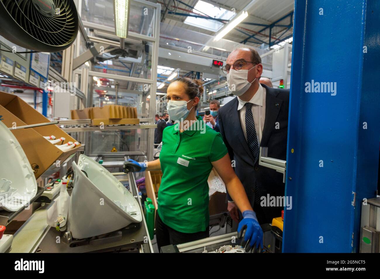 Prime minister Jean Castex talks to employees as he visits the French ...