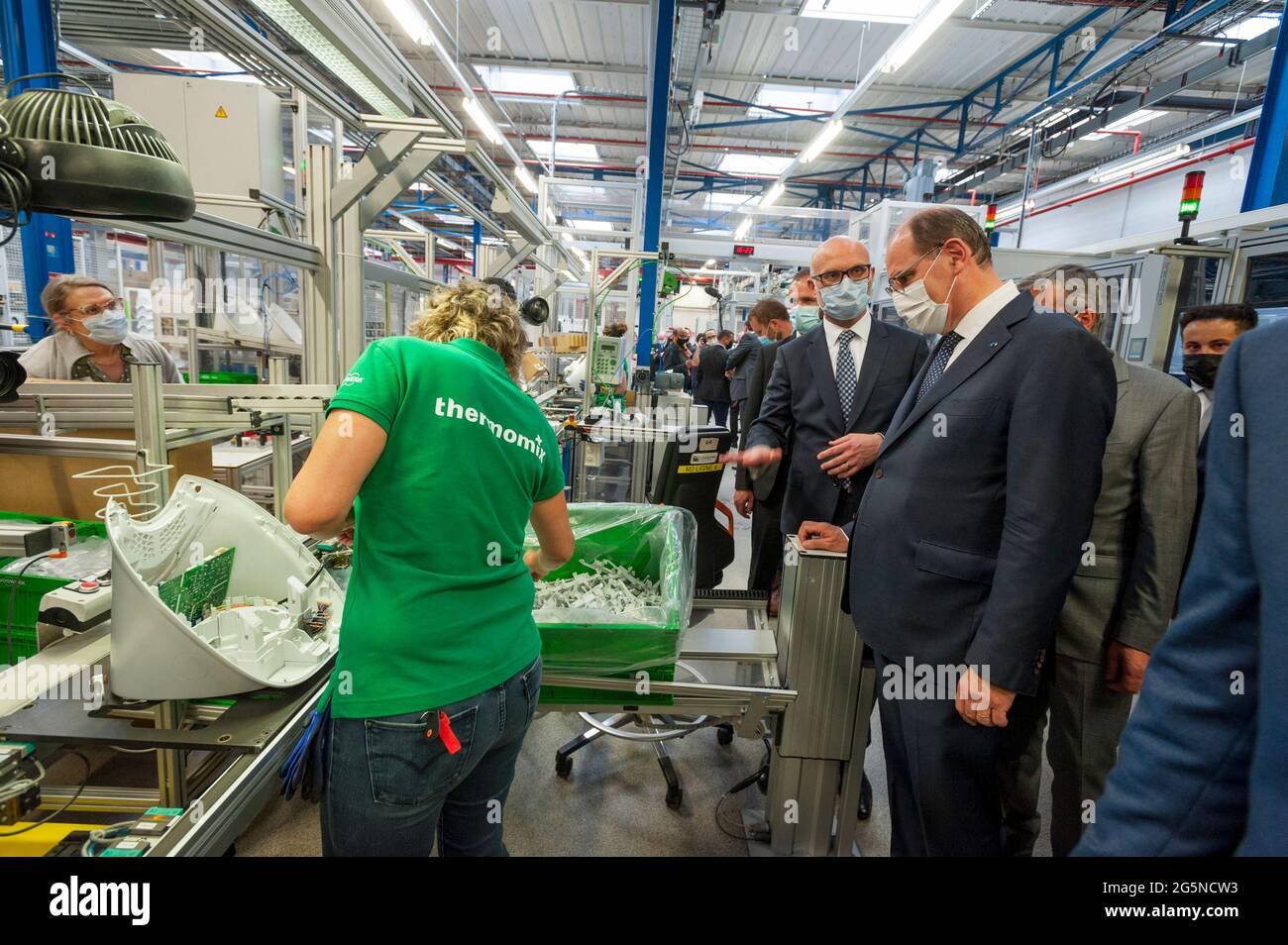 Prime minister Jean Castex talks to employees as he visits the French ...