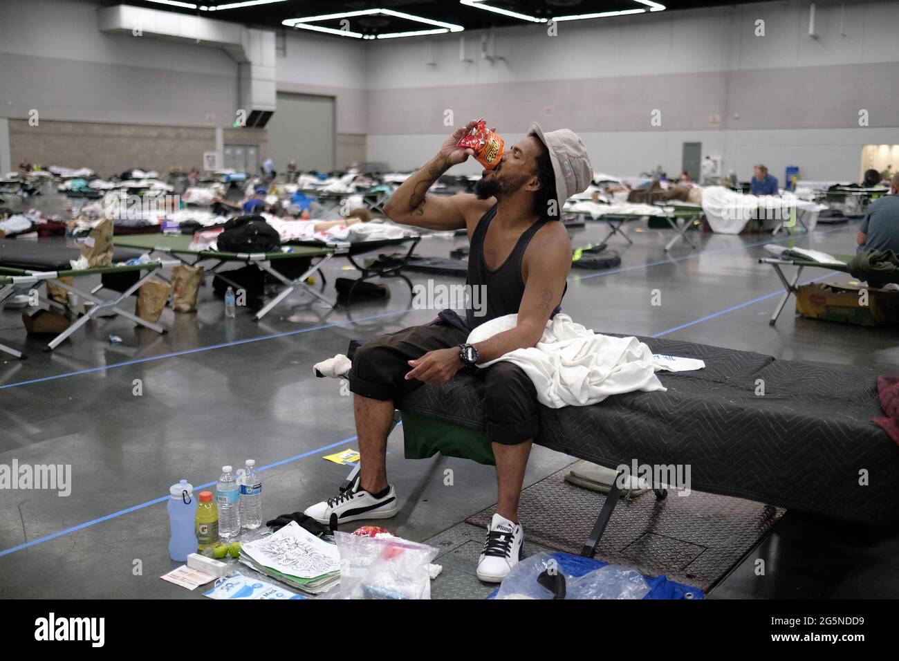 King Born Allah cools off at the Convention Center cooling shelter in ...