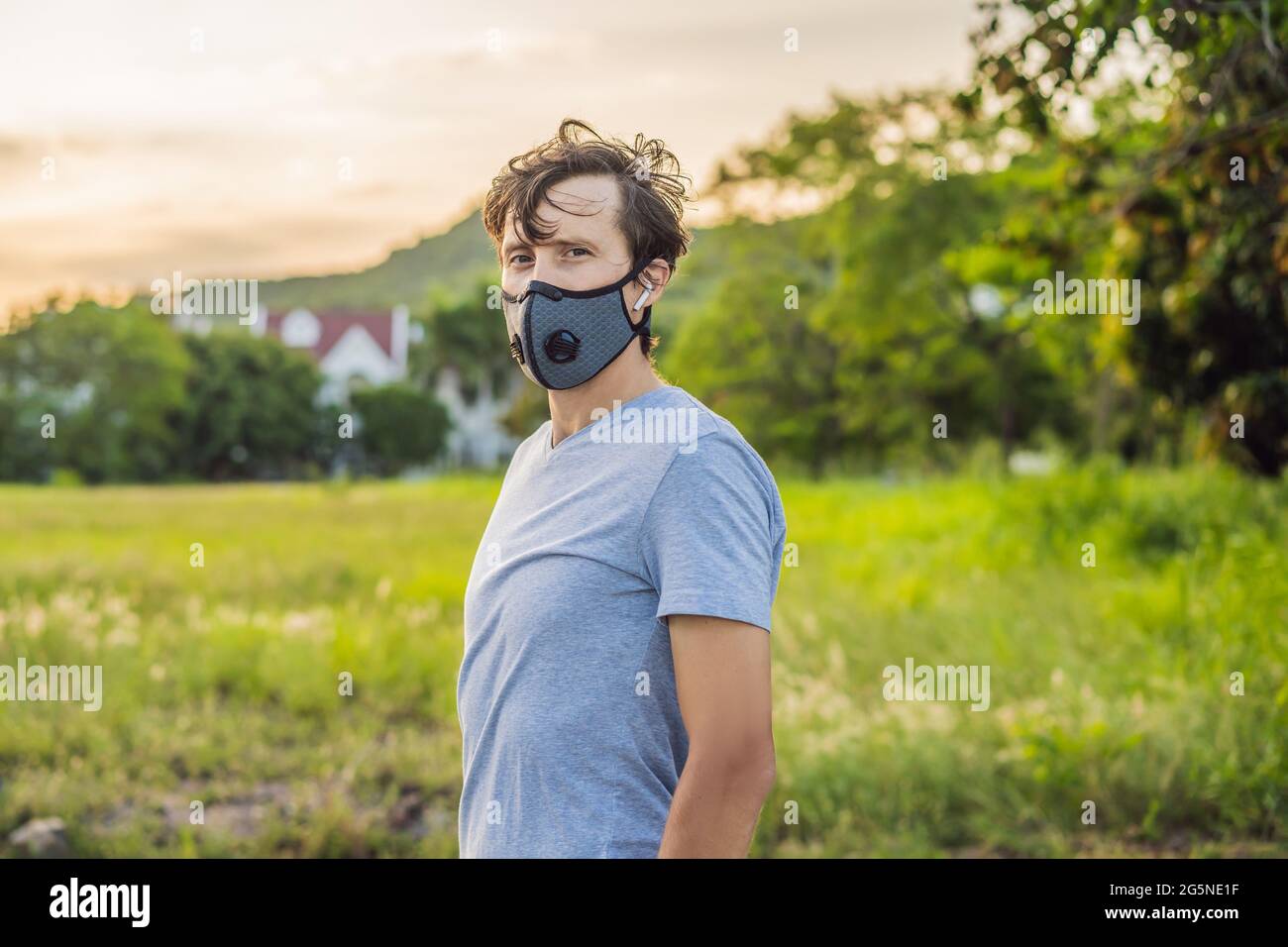 Runner wearing medical mask, Coronavirus pandemic Covid-19. Sport ...