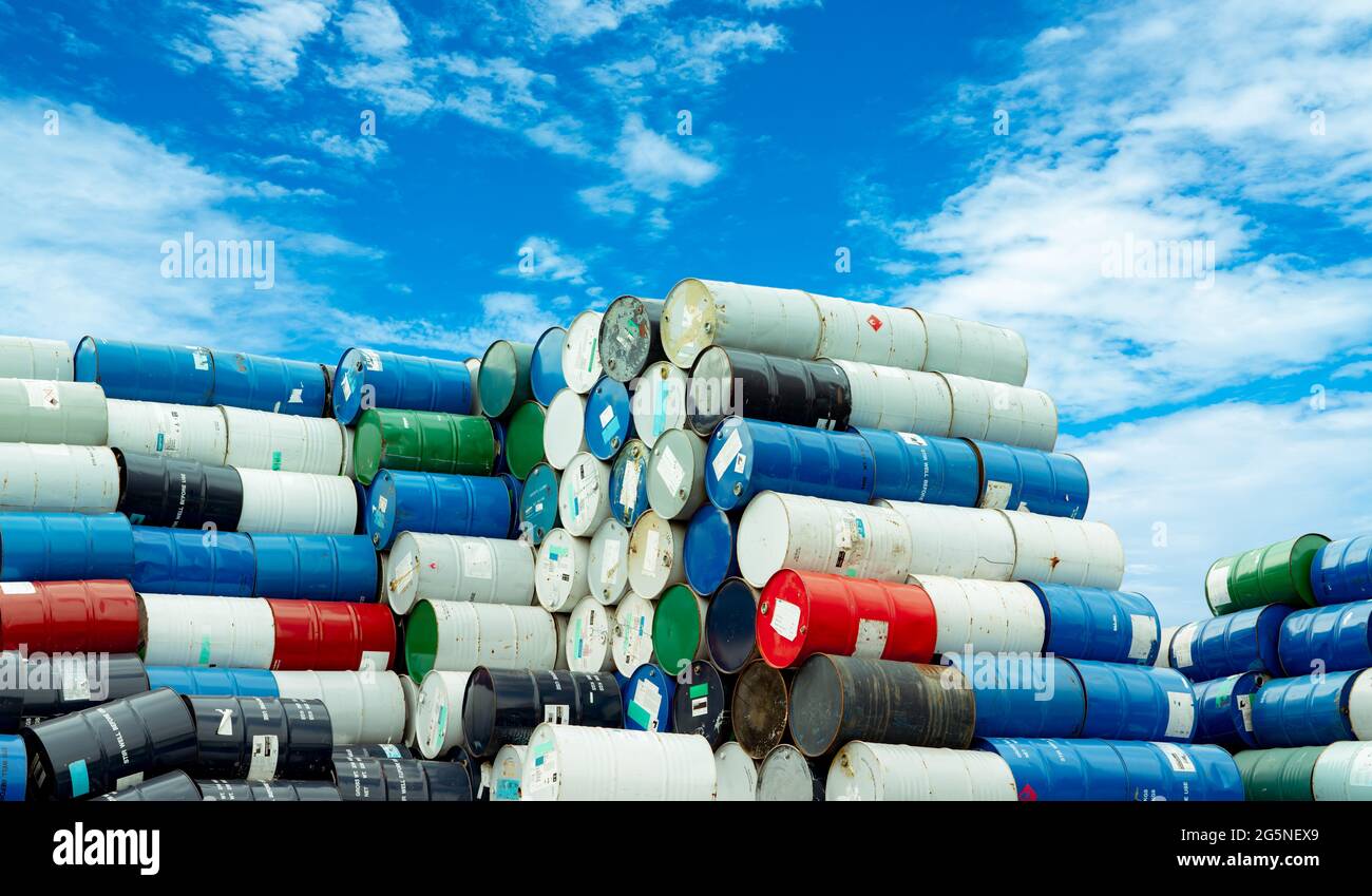 Old chemical barrels. Hazard chemical barrel with warning label. Blue ...