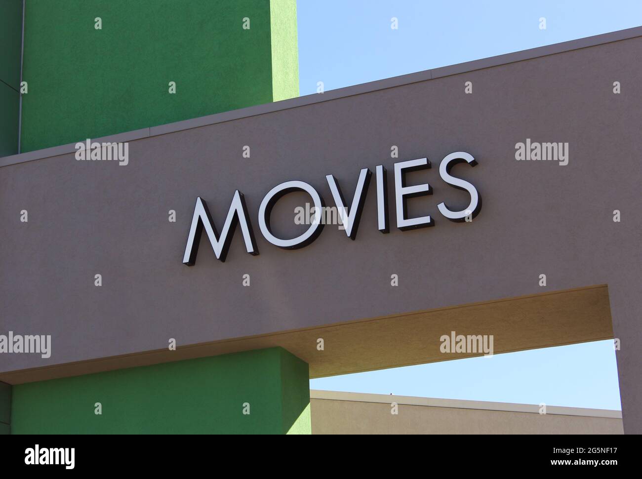 Movies Sign on Cinema Building Stock Photo - Alamy