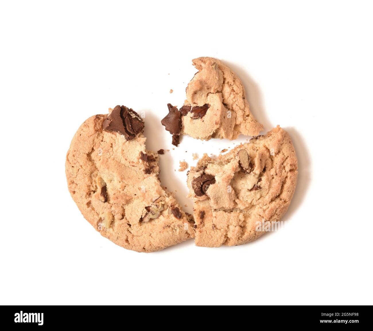 Overhead view of a broken chocolate chip cookie on a white background ...