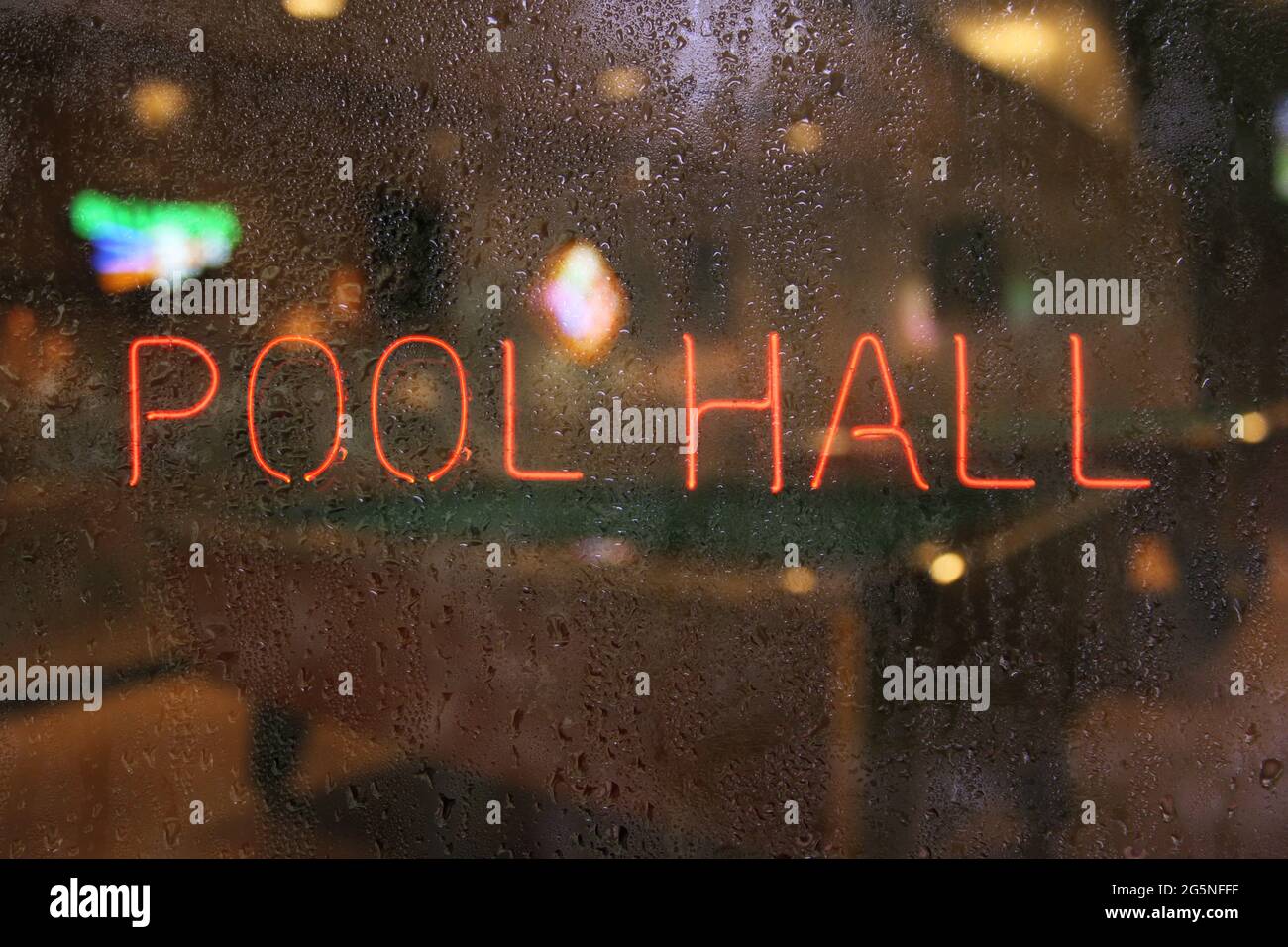 Vintage Neon Pool Hall Sign in Wet Window Stock Photo - Alamy