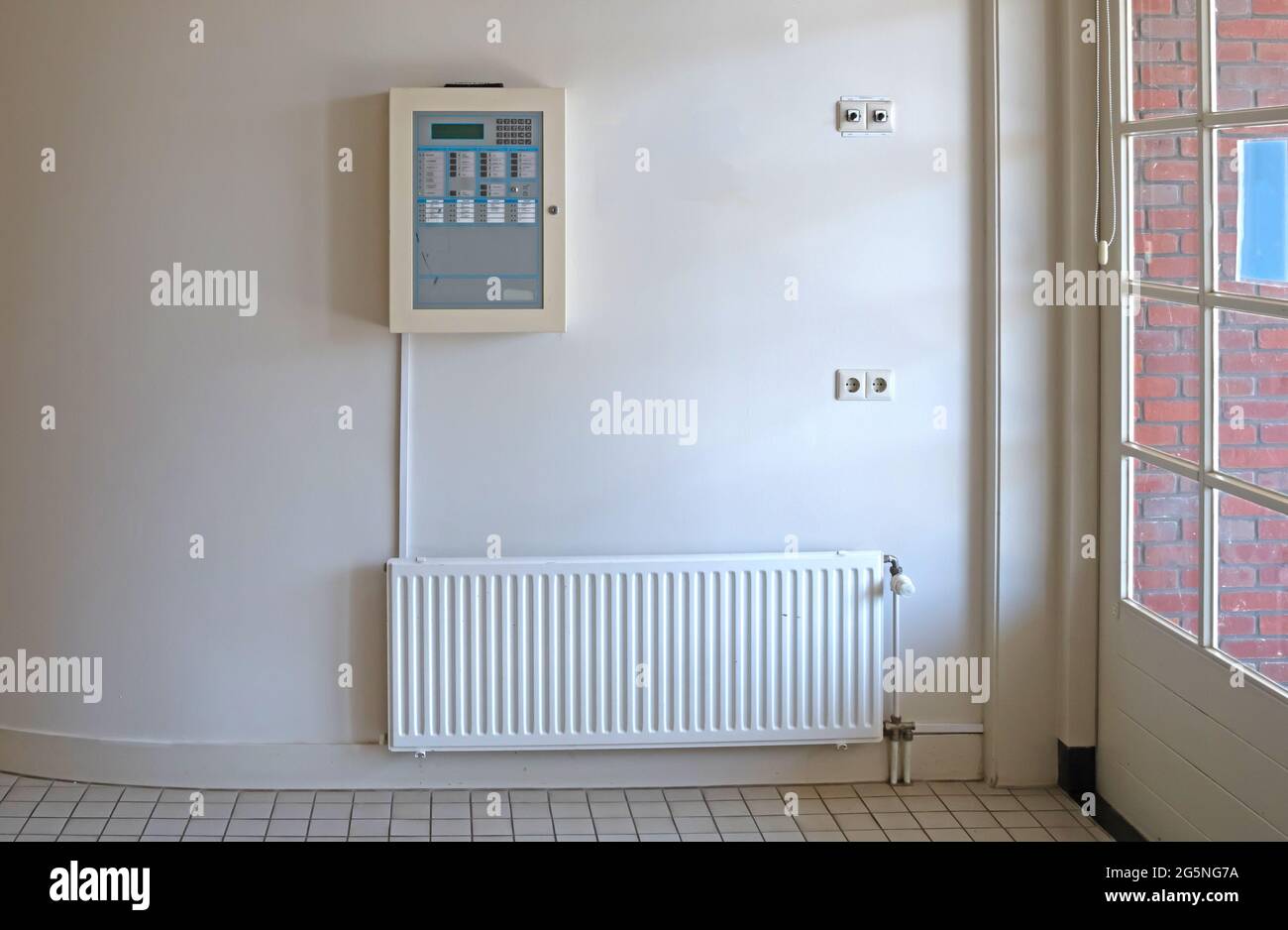 Old security panel on a wall, alarm safety Stock Photo - Alamy