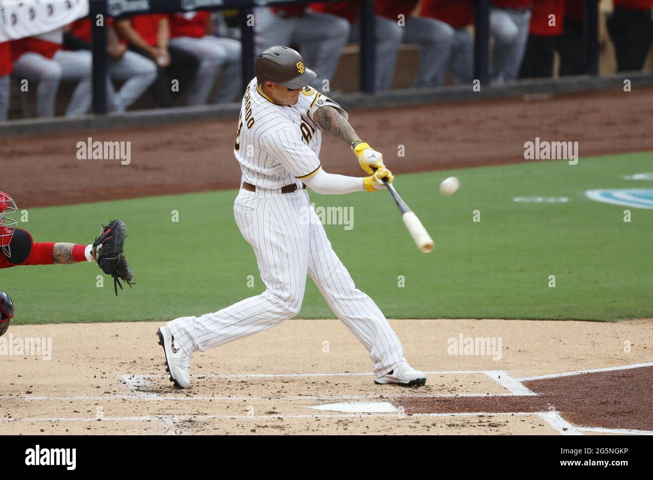Manny Machado of the San Diego Padres swings the bat during a game ...