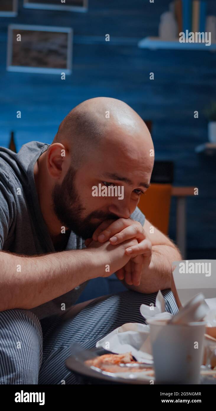 Traumatised man tears sitting on hi-res stock photography and images ...