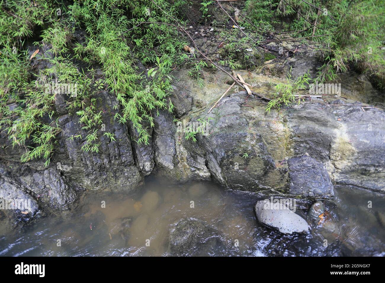 River and water falls runs on sediment rocks at West Java Indonesia ...
