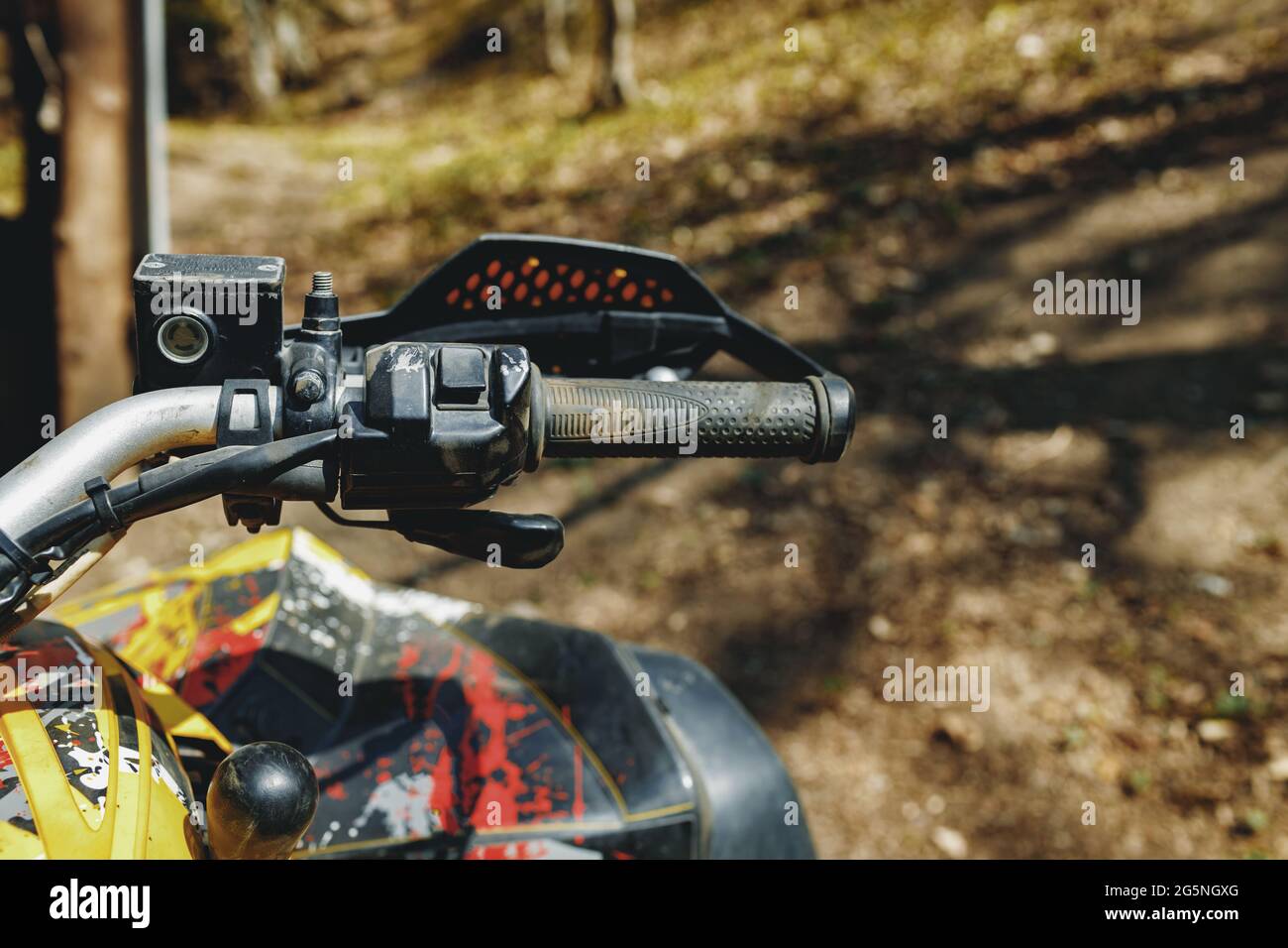 Handlebar of four-wheeled ATV quad bike close up Stock Photo - Alamy