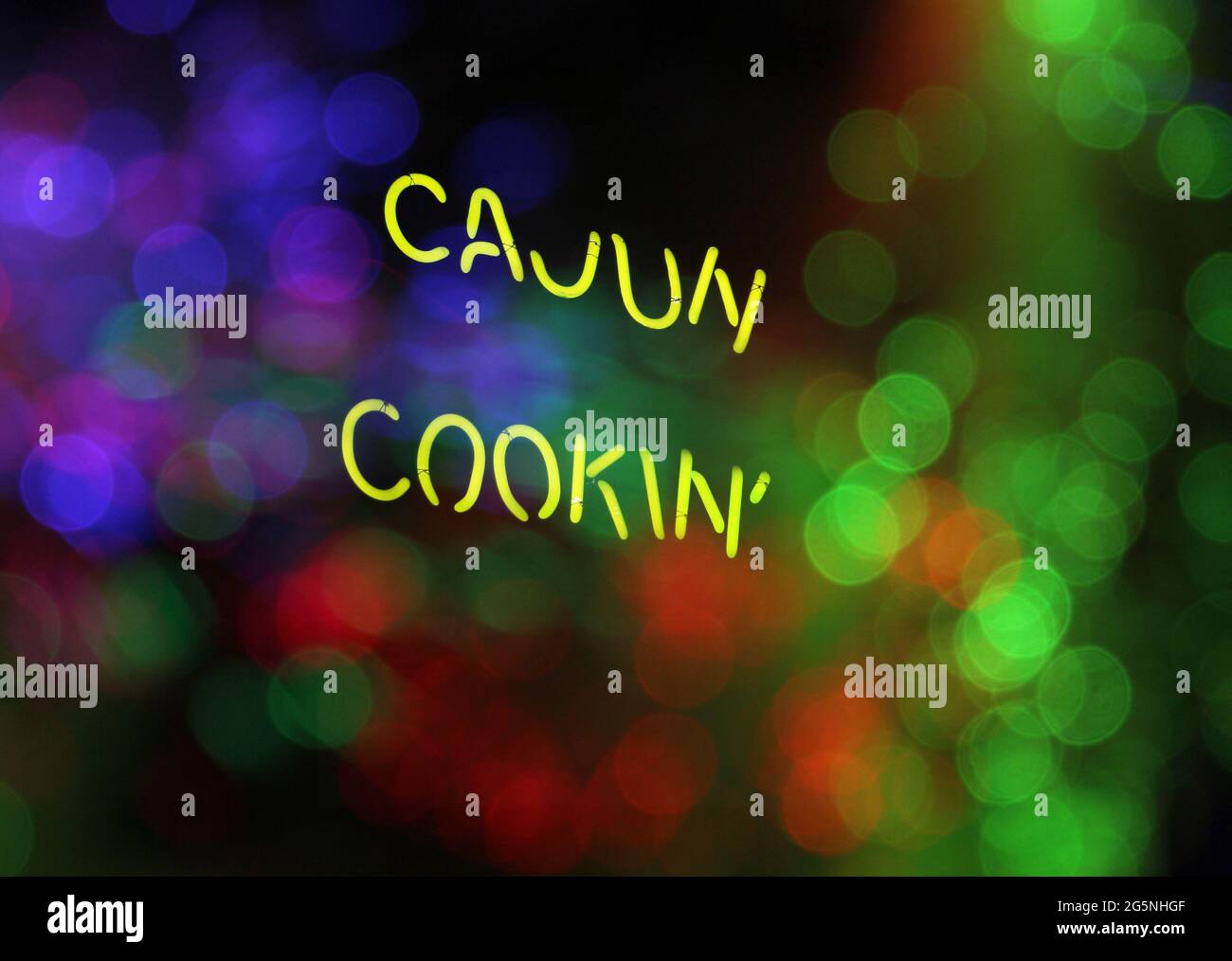 Neon Sign Cajun Food With Festive Bokeh Stock Photo - Alamy