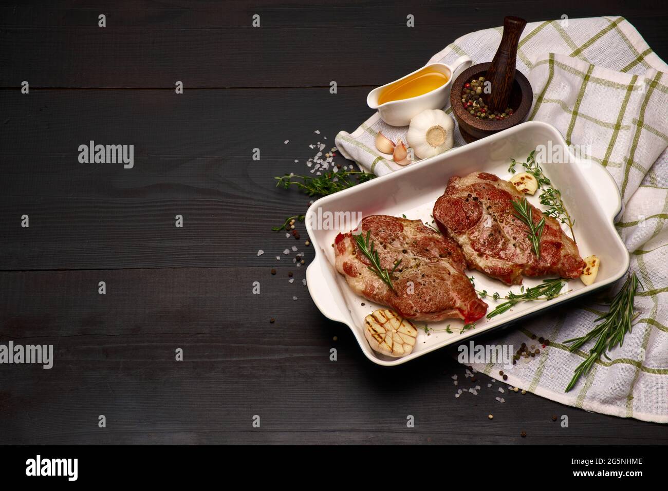 Grilled roated beef steaks in baking dish Stock Photo - Alamy