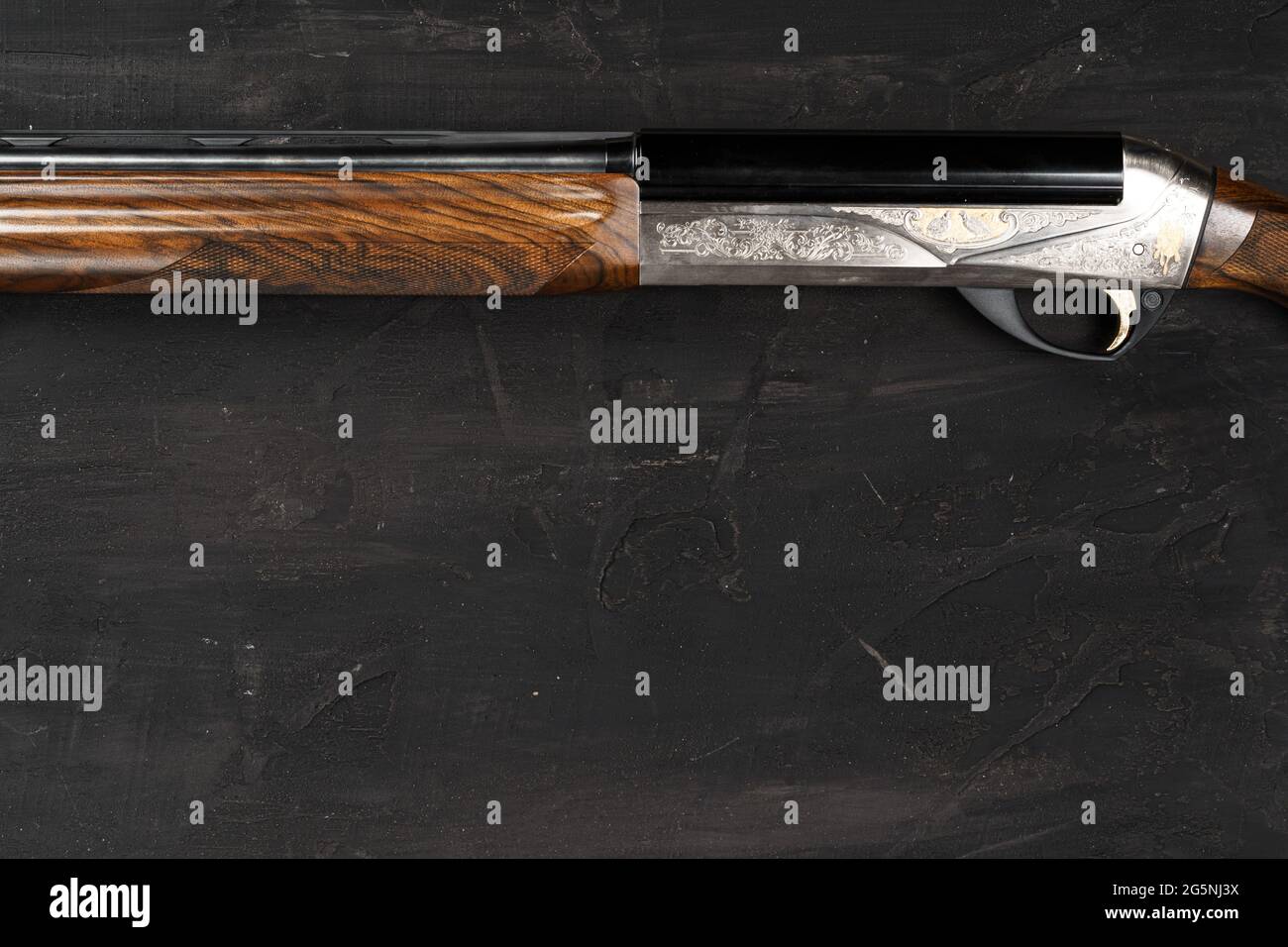 Smoothbore hunting gun on black background close up Stock Photo - Alamy