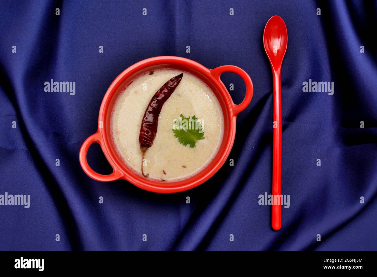Kadhi or kadi, is an authentic Indian food, looks like Curry which is ...