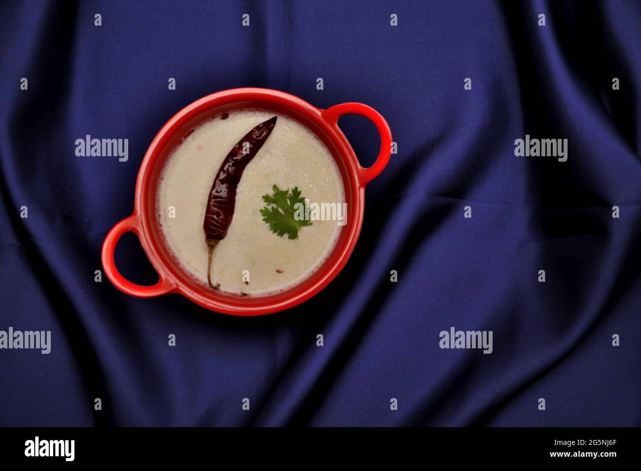 Kadhi or kadi, is an authentic Indian food, looks like Curry which is ...
