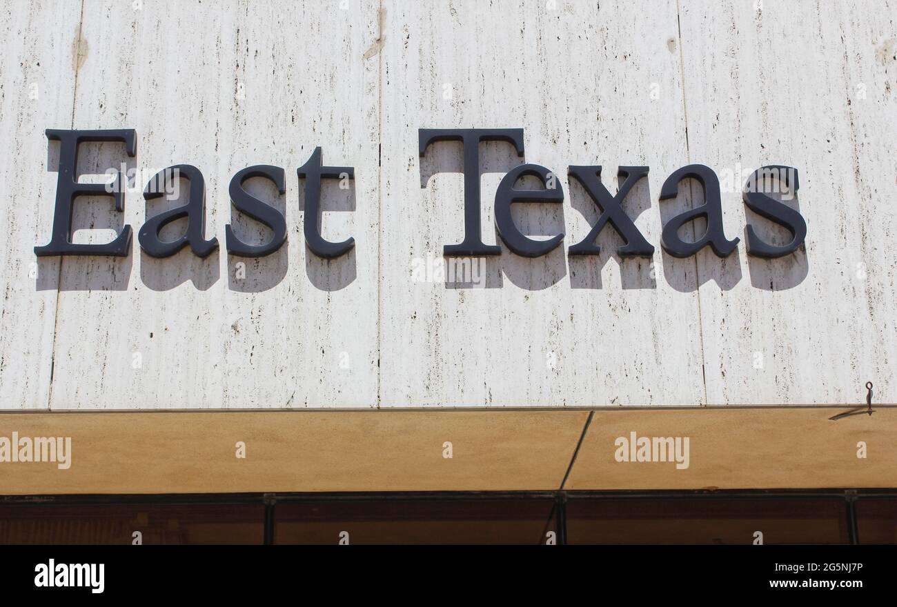 Vintage East Texas Sign on Building Stock Photo - Alamy