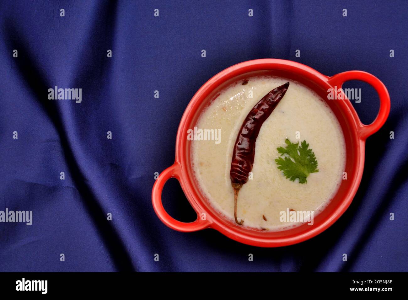 Kadhi or kadi, is an authentic Indian food, looks like Curry which is ...