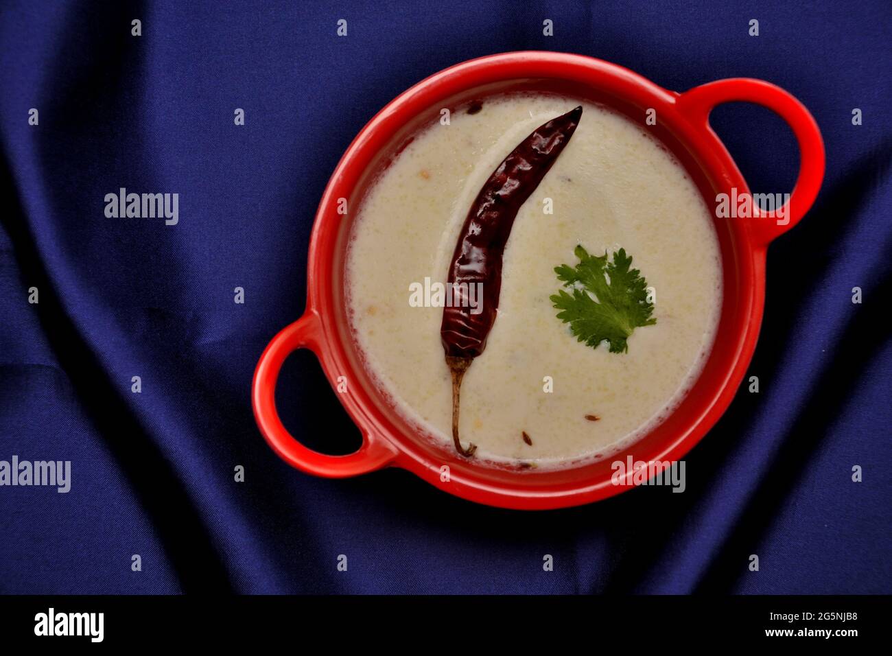 Kadhi or kadi, is an authentic Indian food, looks like Curry which is ...