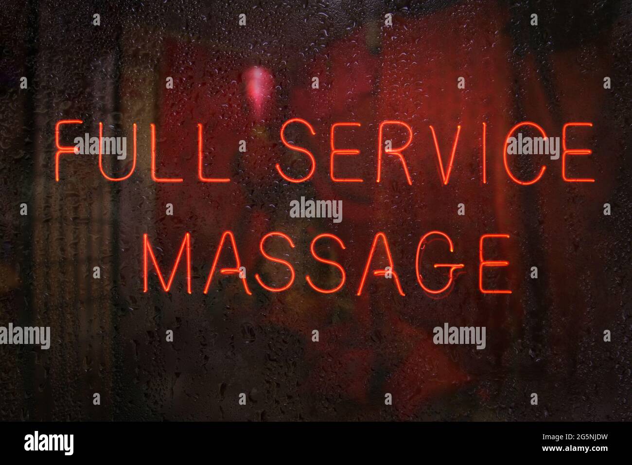 Vintage Neon Sign in Window Asian Massage Stock Photo - Alamy