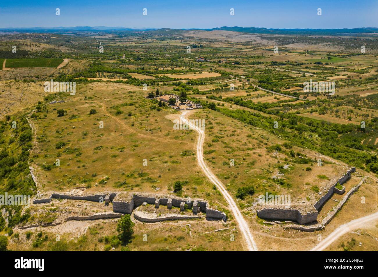 Stone ruins of ancient town of Asseria in Dalmatia, Croatia. Aerial ...