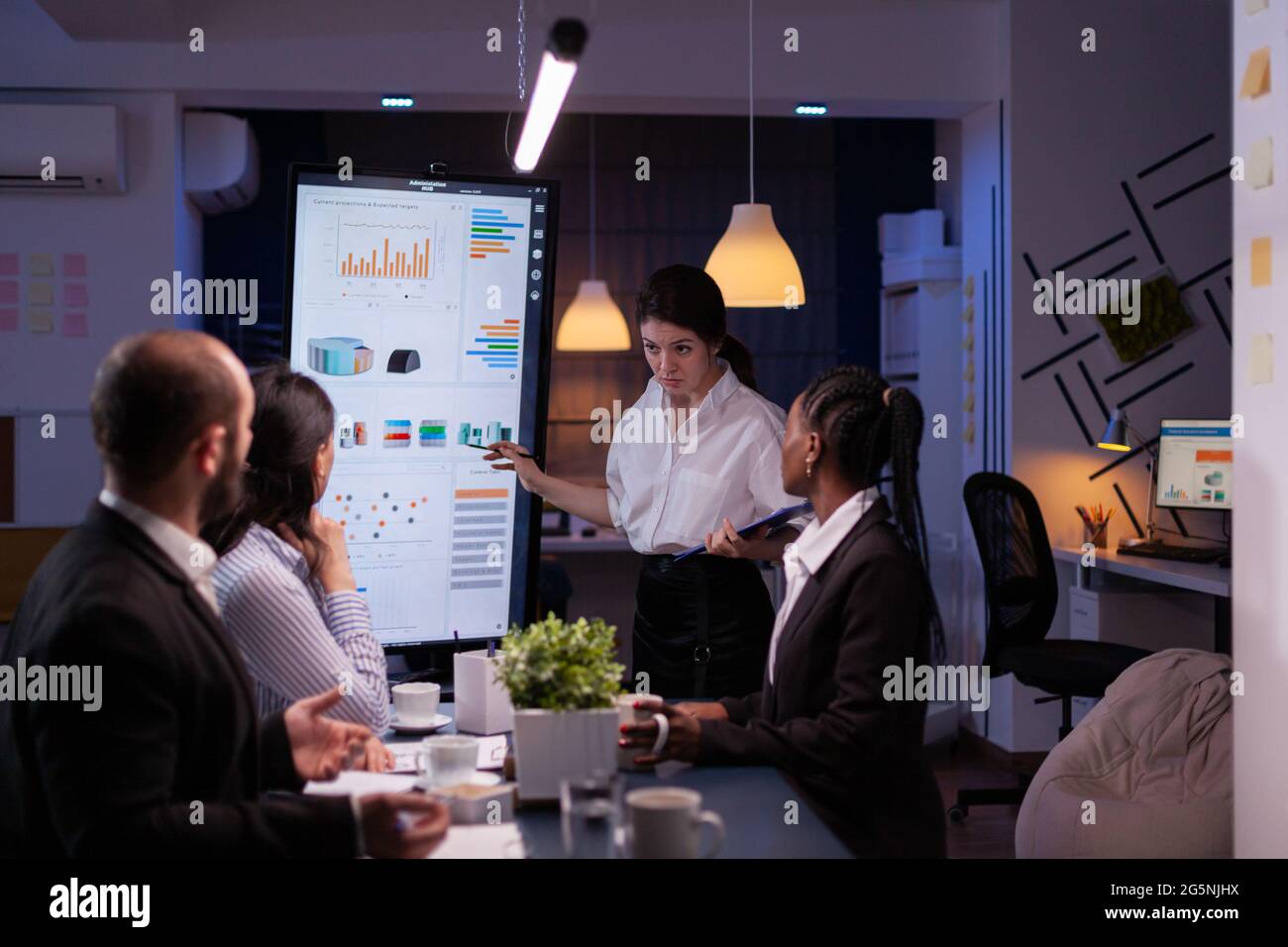 Workaholic entrepreneur woman discussing management statistics ...