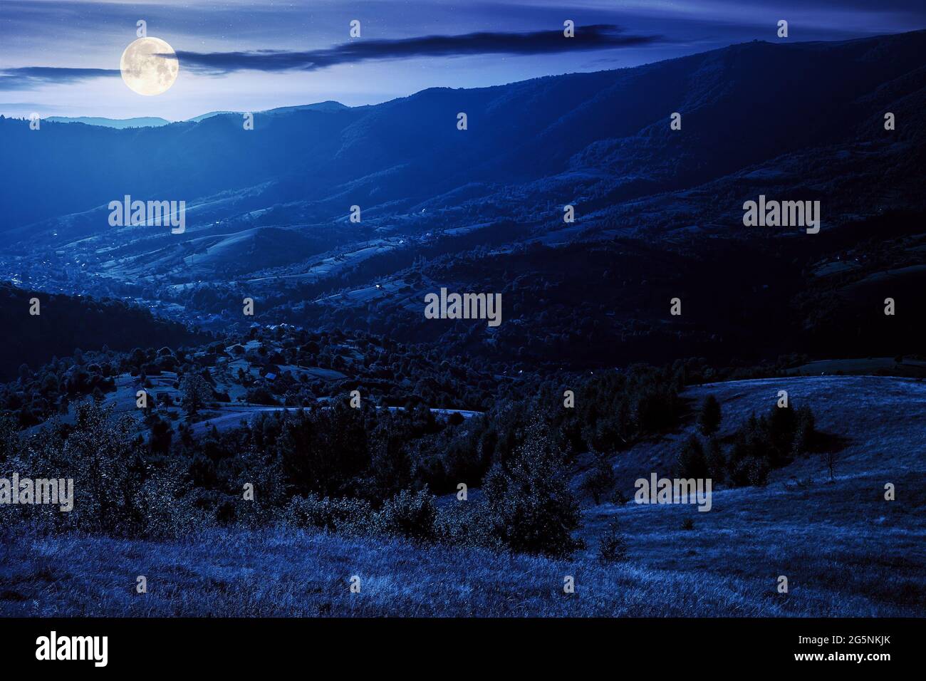 rural landscape at night. beautiful countryside scenery of carpathian ...
