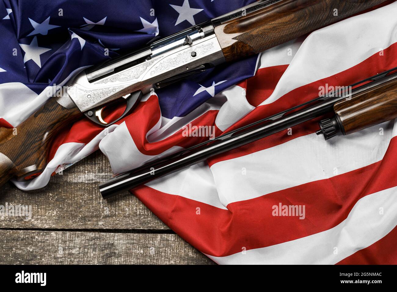 Automatic rifle on USA flag on wooden background Stock Photo - Alamy
