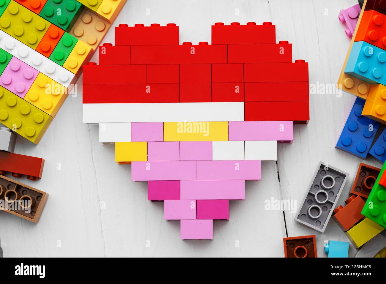Heart shaped toy constructor details on white background Stock Photo ...