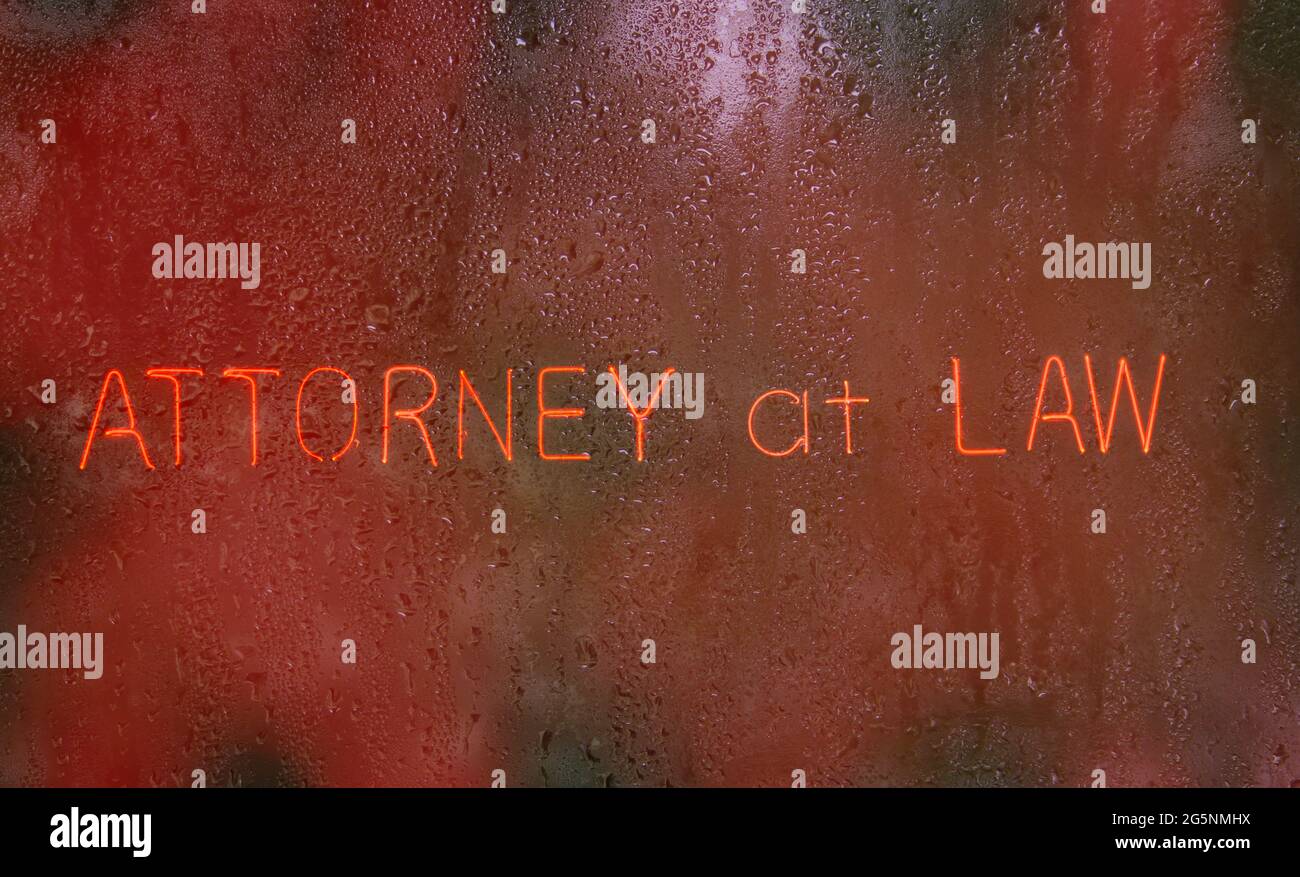 Attorney at Law Neon Sign in rainy window Stock Photo - Alamy