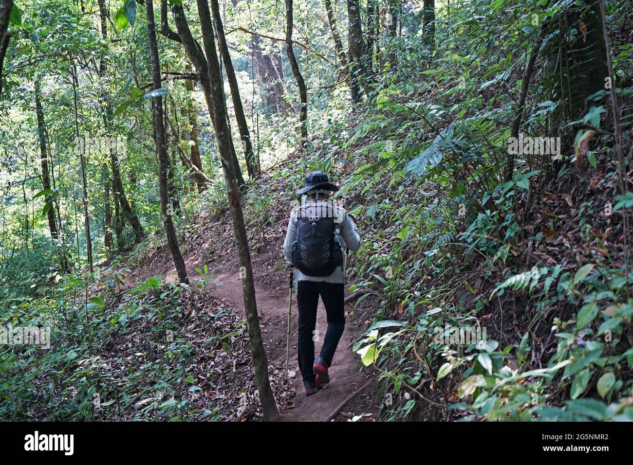 Woman resting on pole hi-res stock photography and images - Alamy