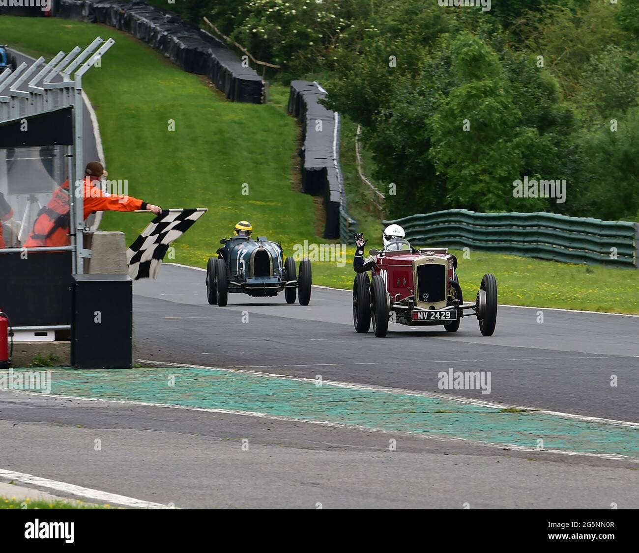Edward Williams, Frazer Nash TT replica, crosses the finish line just ...