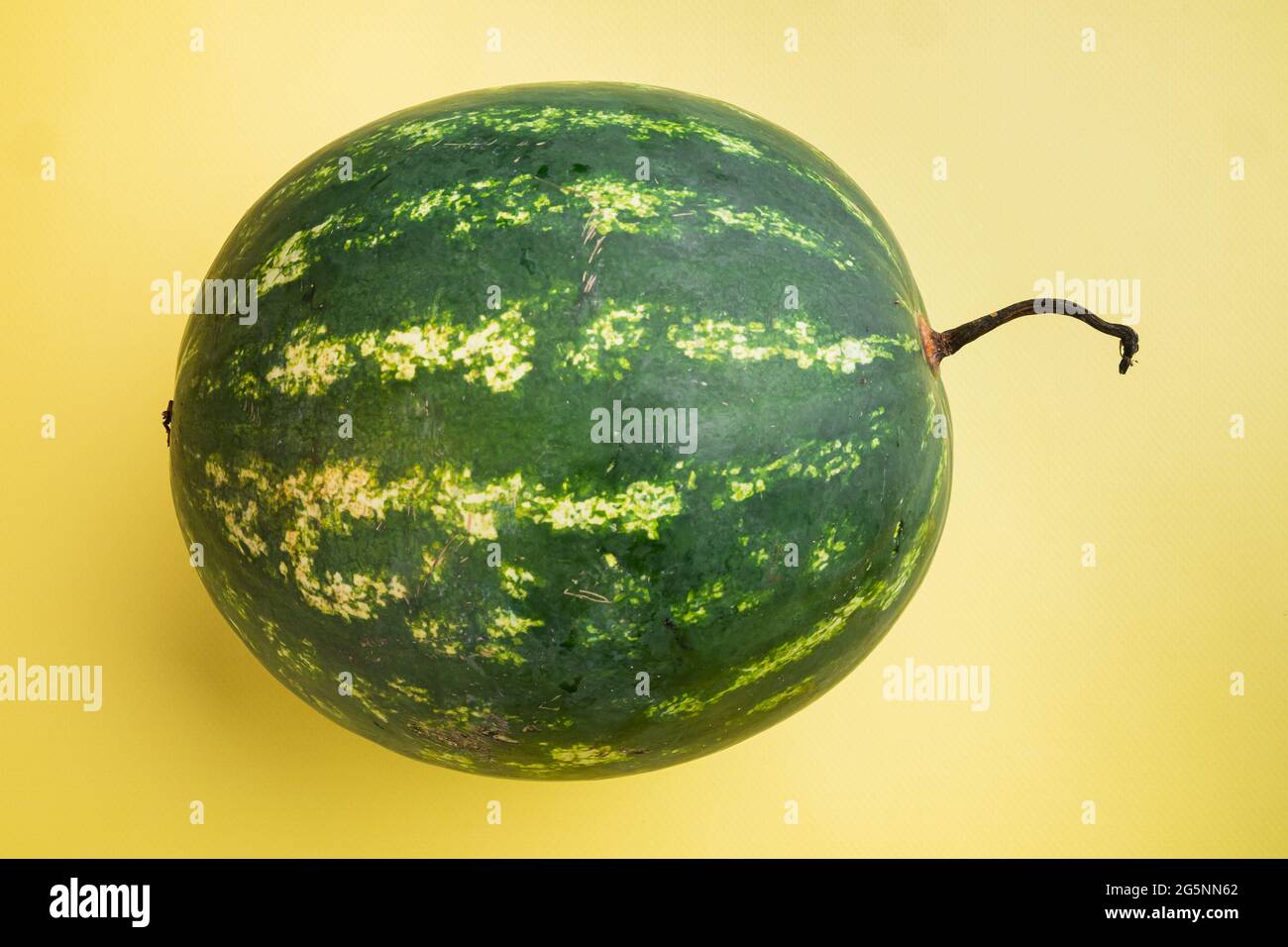 Organic watermelon set, on yellow textured summer background Stock ...