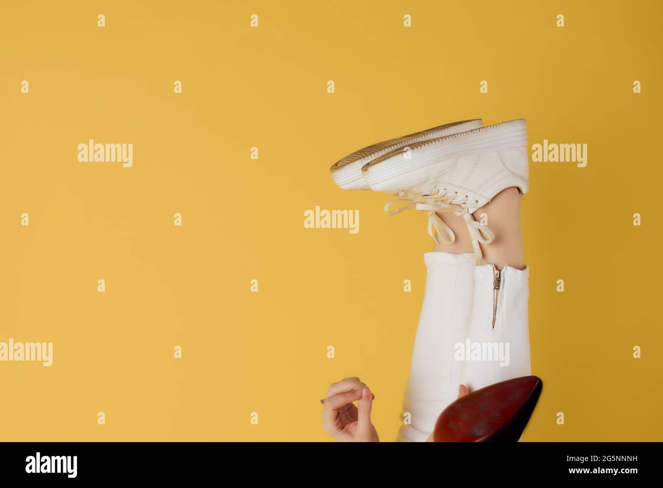 womens inverted feet white sneakers fashion street style Stock Photo ...