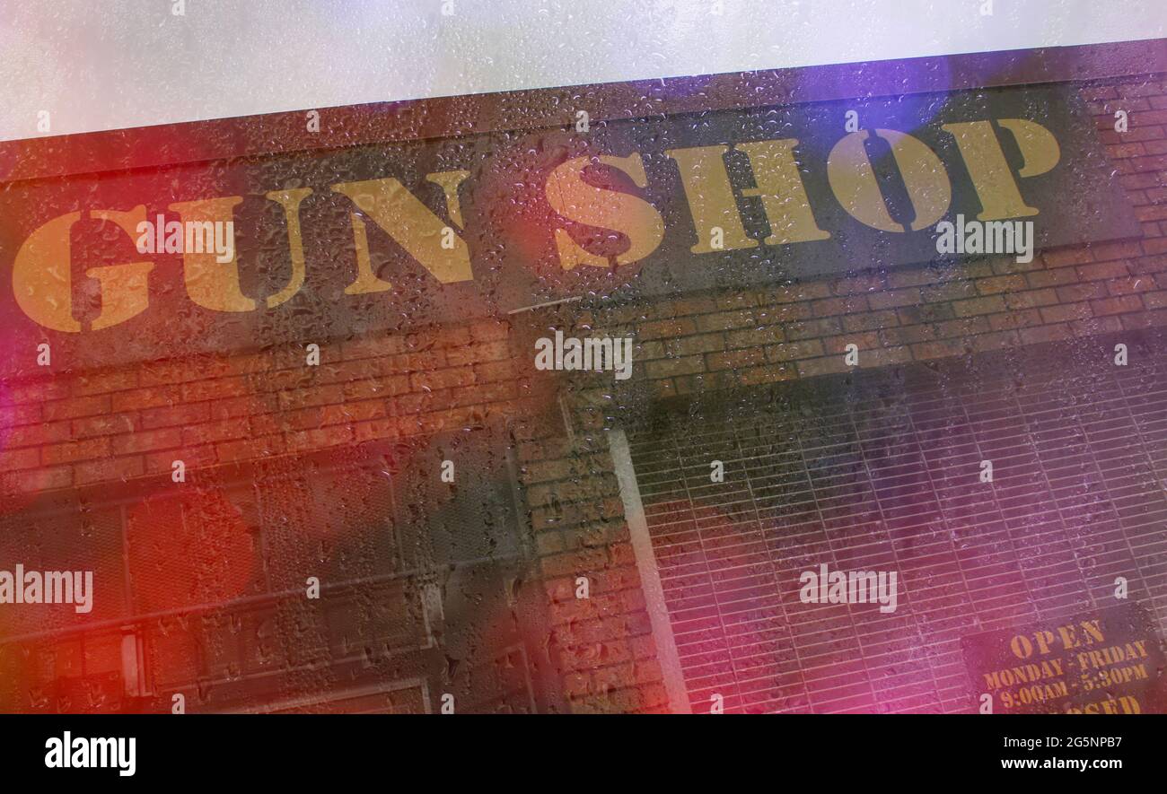 Gun Store Sign on rainy day Stock Photo - Alamy