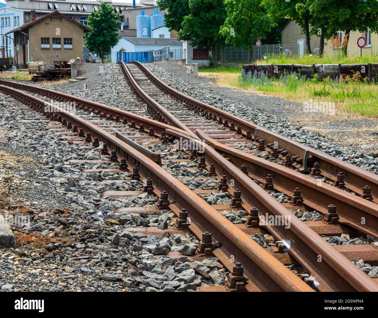 low angle view of a railroad junction of a narrow gauge railroad in ...