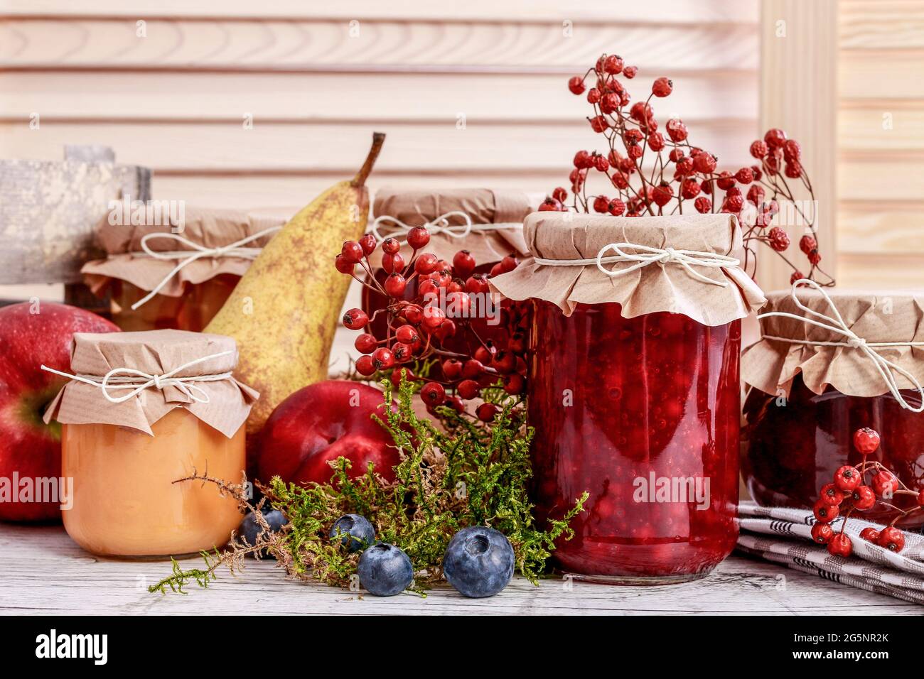 Glass jars with red jam. Autumn fruits around. Healthy food Stock Photo ...