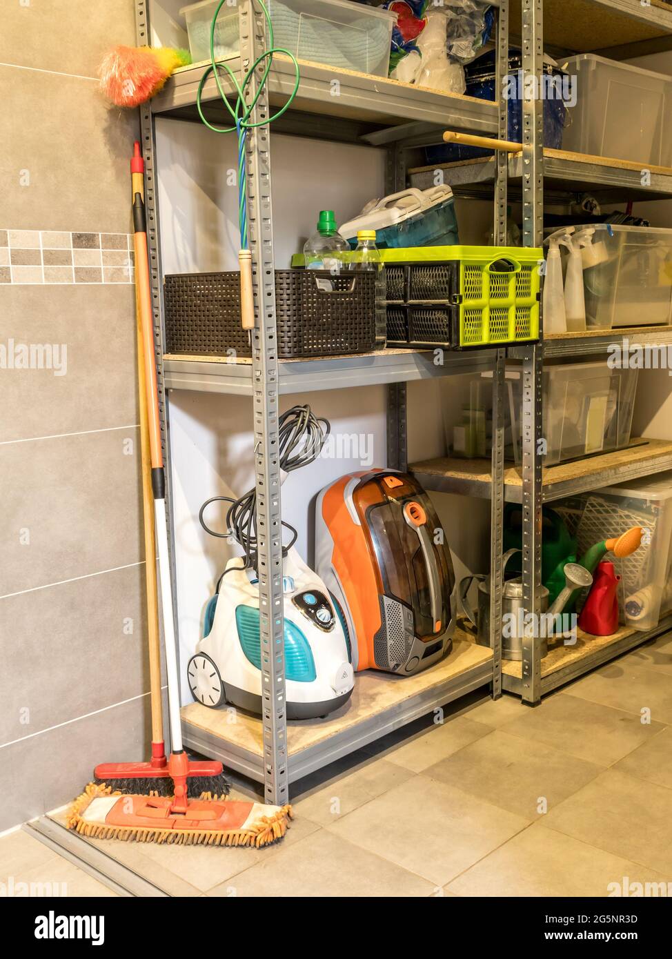 Storage room with household cleaning staff accessories Stock Photo - Alamy