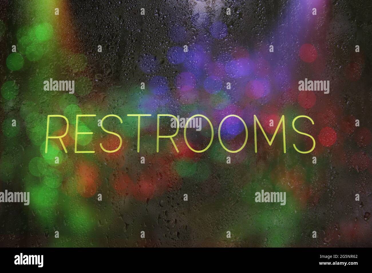 Neon Rainy Window Restroom Sign Stock Photo - Alamy