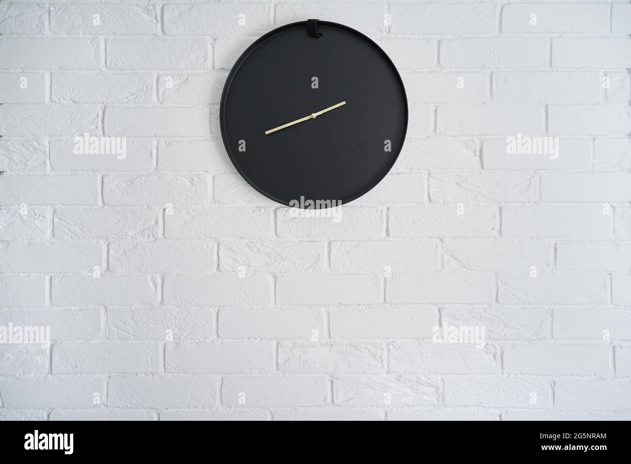 Brick wall with clock hi-res stock photography and images - Alamy