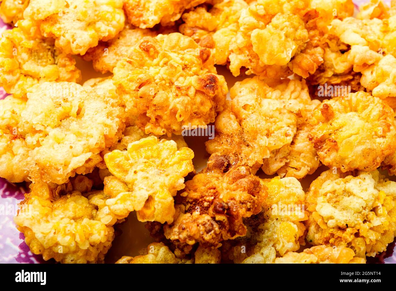 Tasty fried edible flowers. Chrysanthemum flowers in batter.Food ...