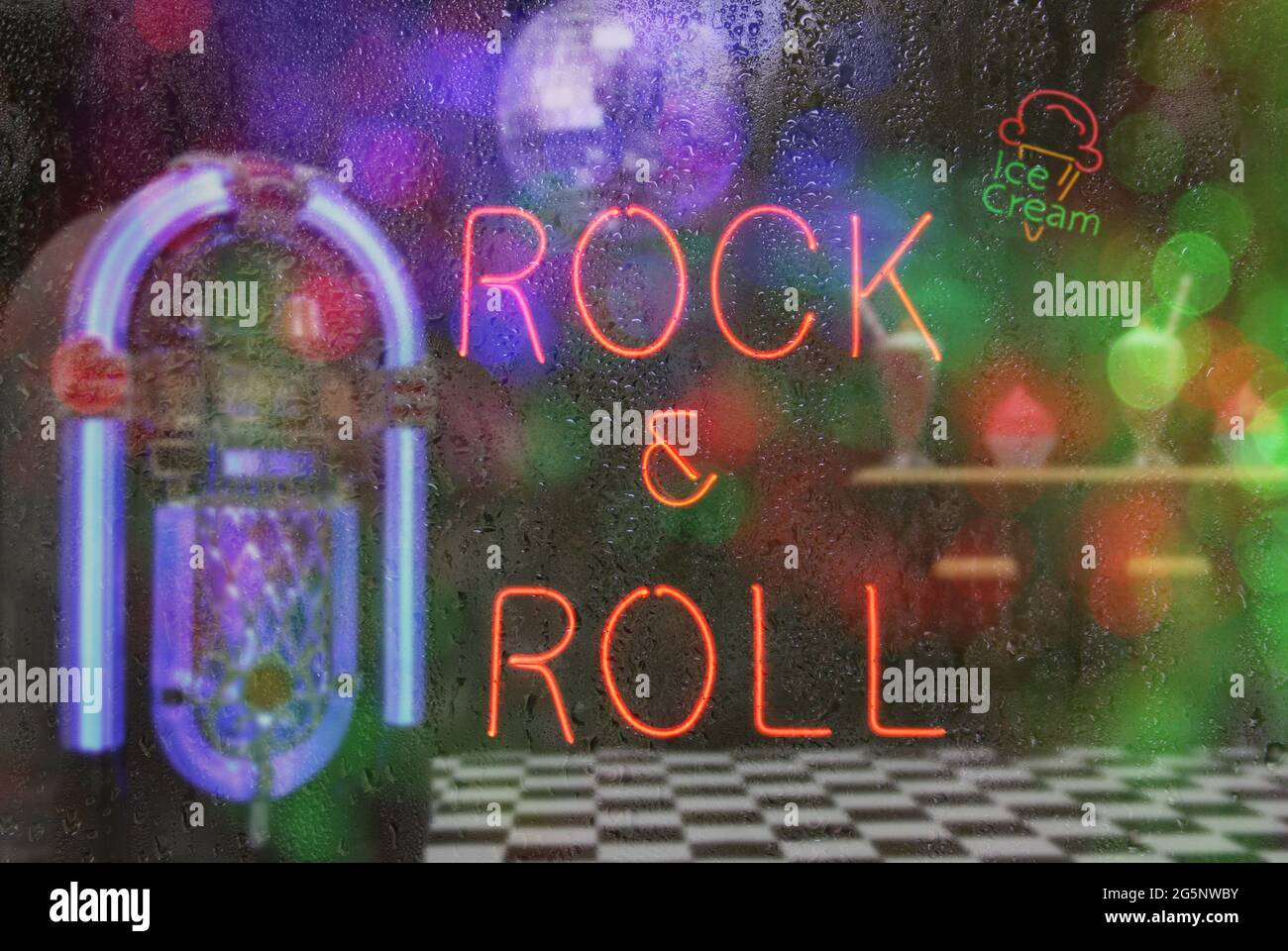 Jukebox in Bar with Neon Signs - Rock and Roll Stock Photo - Alamy